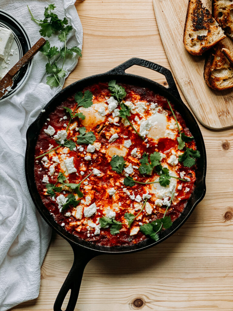 Shakshuka (Eggs Poached in Tomato Sauce with Sausage, Peppers, and Feta ...