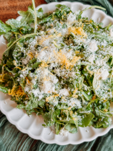 Arugula Salad with Calabrian Chili Oil, Lemon, and Parmesan - Whip & Wander