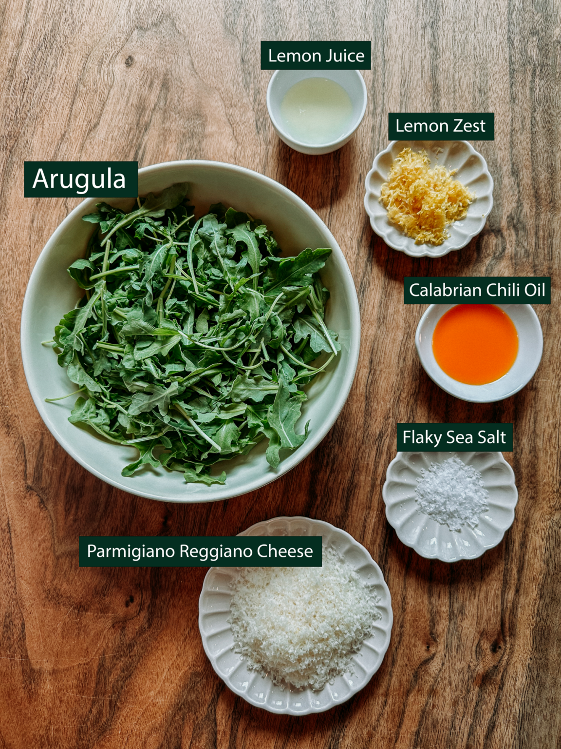 Arugula Salad with Calabrian Chili Oil, Lemon, and Parmesan - Whip & Wander