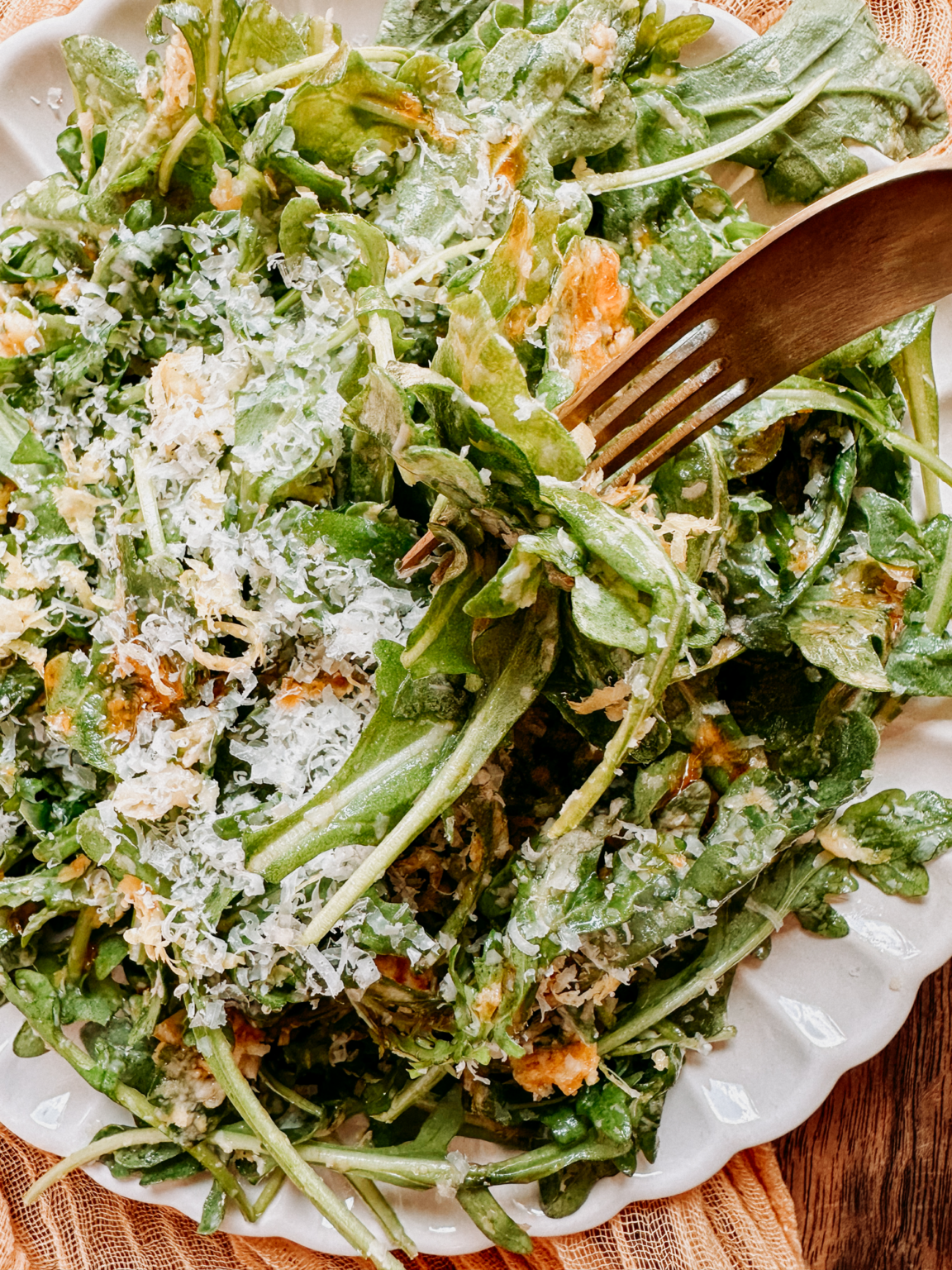 Arugula Salad with Calabrian Chili Oil, Lemon, and Parmesan - Whip & Wander